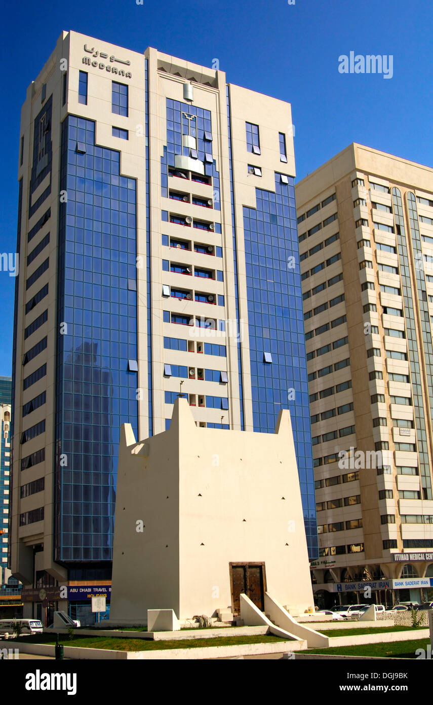 Reconstructed medieval watchtower in front of the Moderna skyscraper on ...