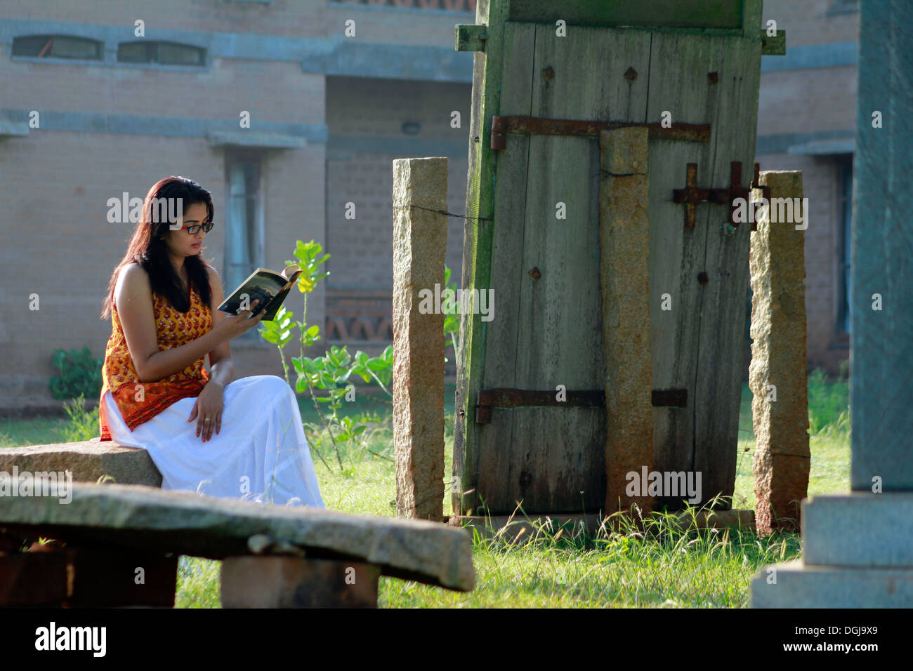 Indian girl reading a book hi-res stock photography and images - Alamy