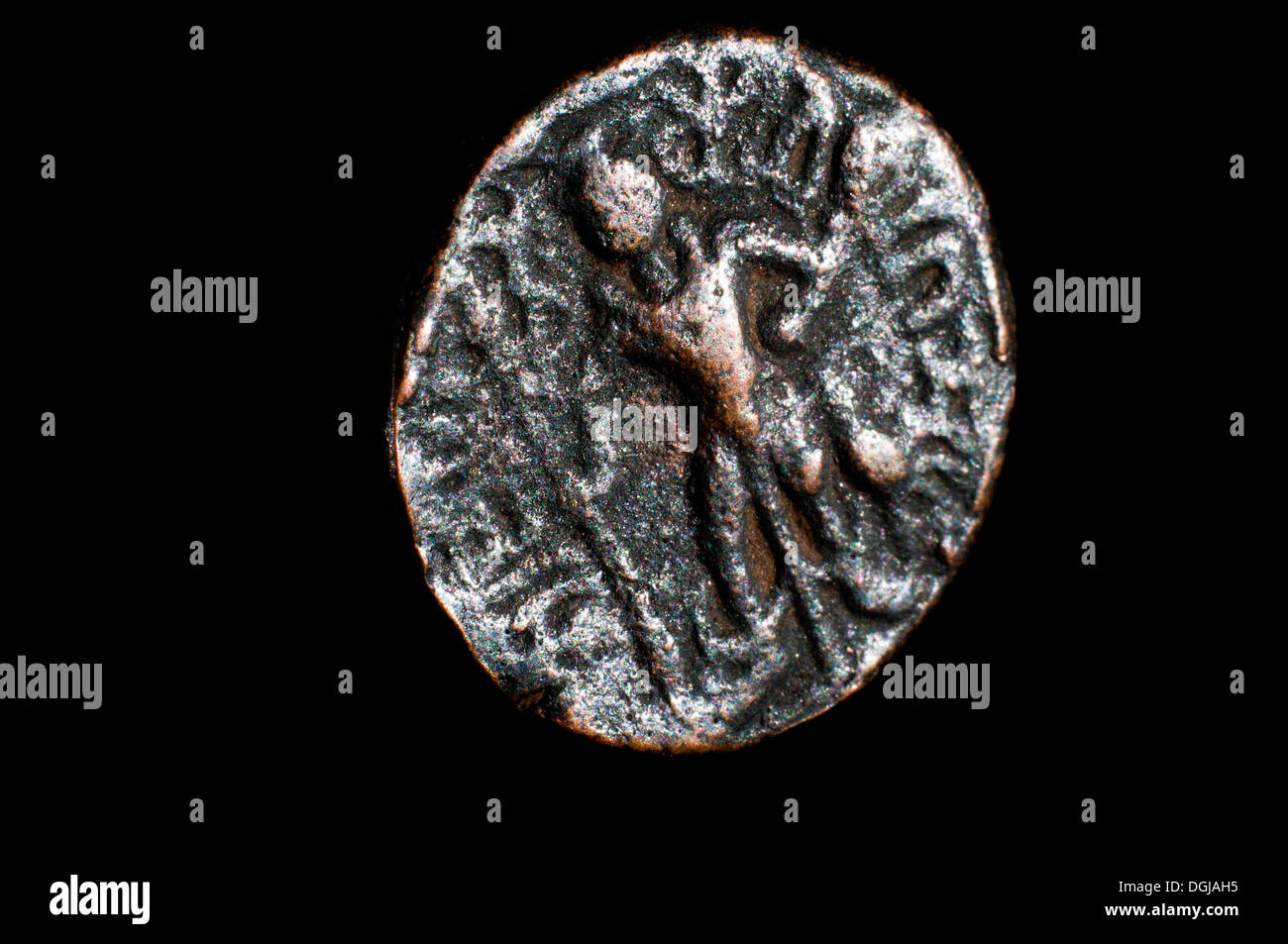 ancient indo-greek kushan empire coin in studio setting Stock Photo - Alamy
