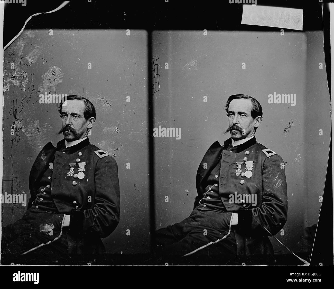 An official portrait of a uniformed officer. The image focuses on the ...