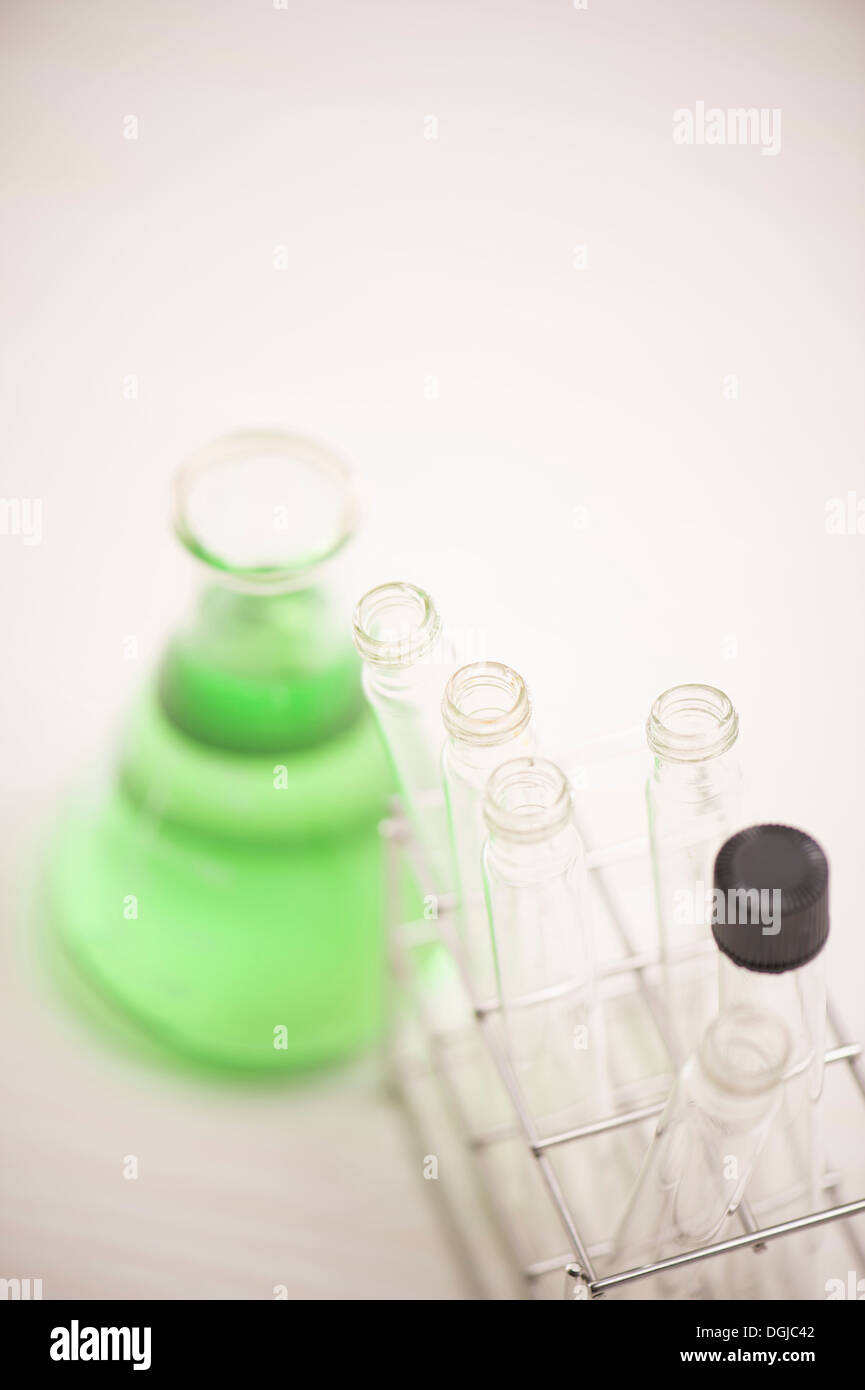 a set of chemistry bottles on a table Stock Photo - Alamy