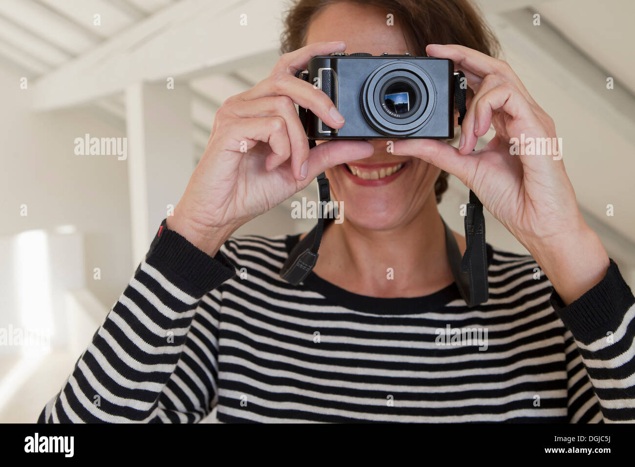 Personal perspective of woman taking photograph Stock Photo - Alamy