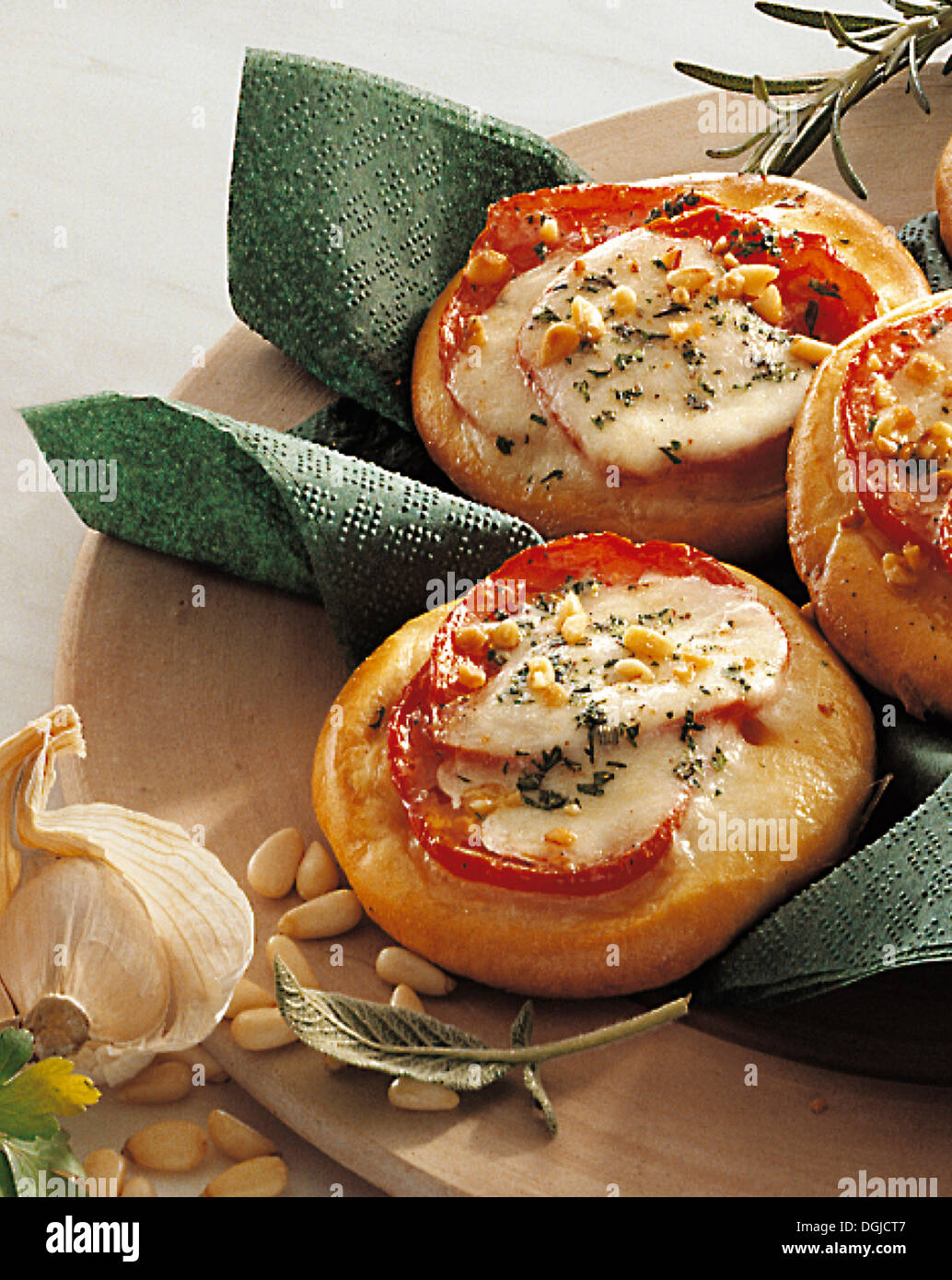 Mini pizzas with herbs, Italy Stock Photo - Alamy