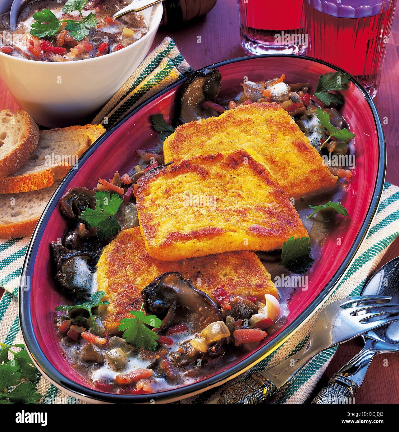 Polenta with porcini mushroom sauce hi-res stock photography and images ...
