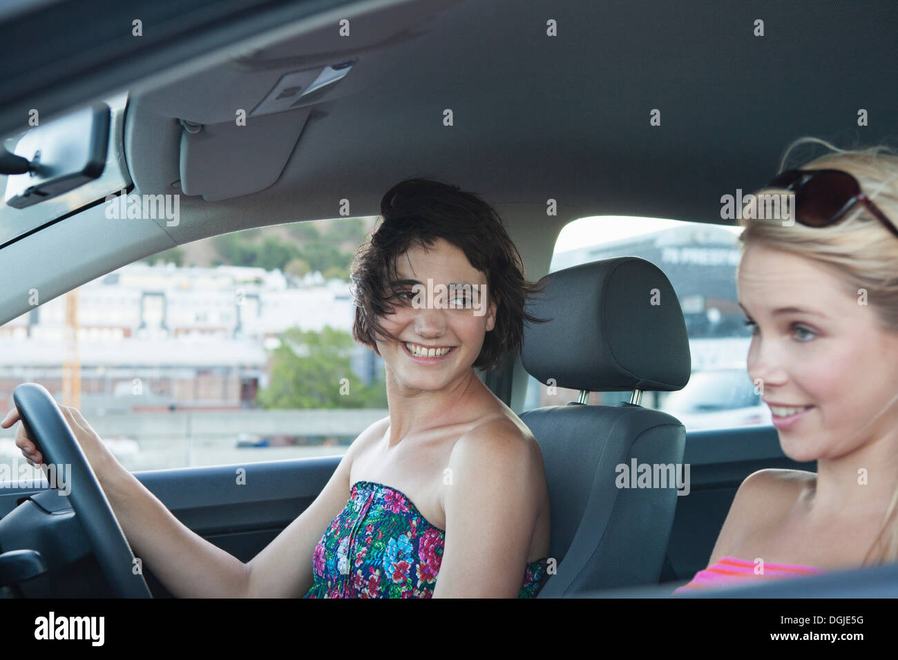 Two women driving car Stock Photo - Alamy