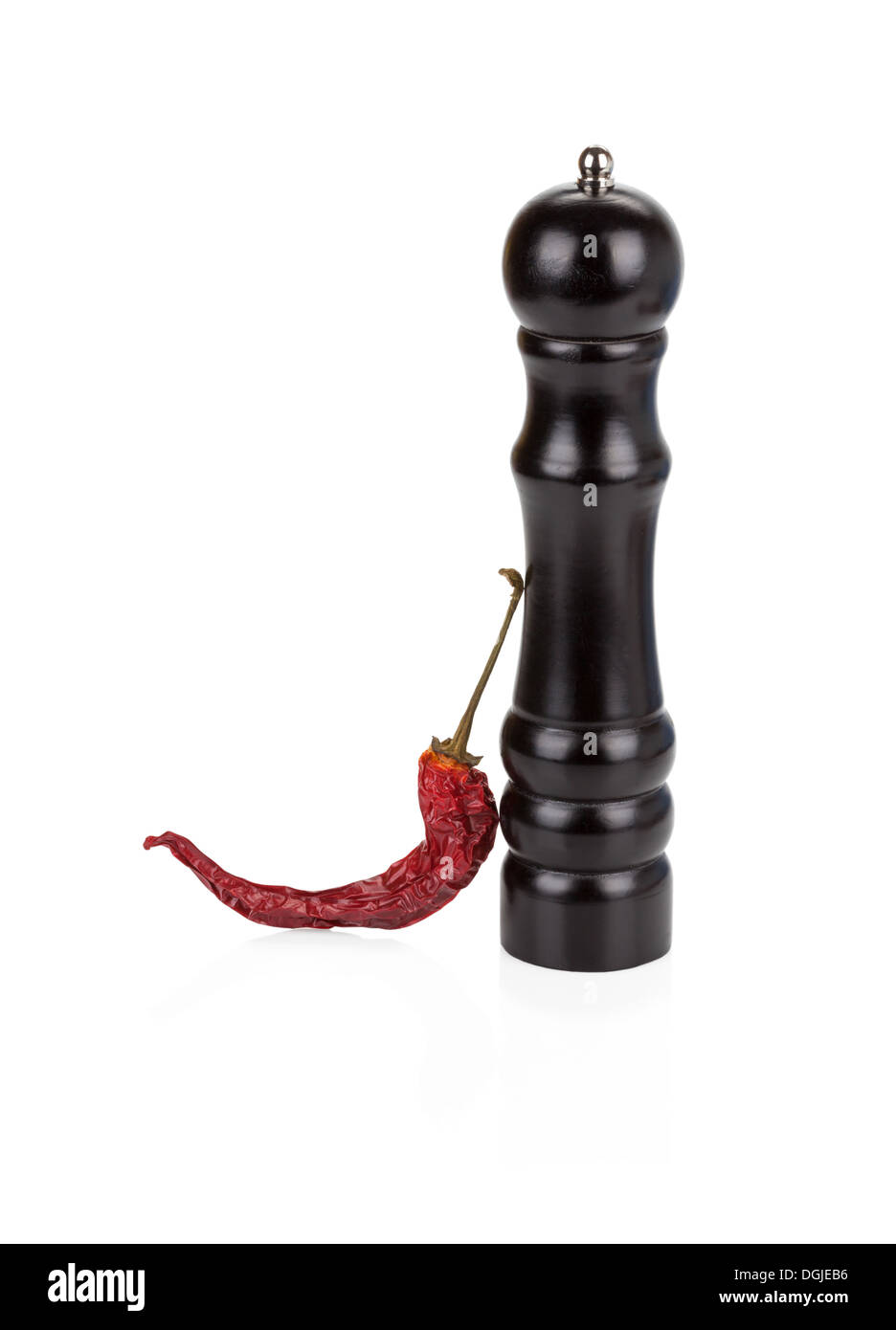 Black wooden shaker with chilly pepper isolated on white background ...