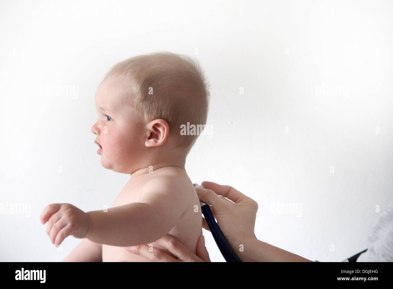 Baby boy having medical examination Stock Photo - Alamy