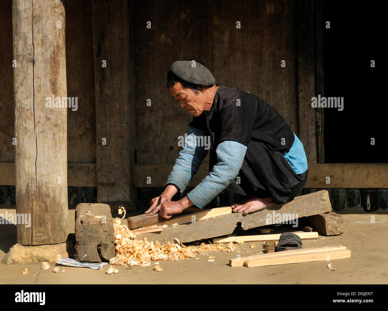 Man planing a piece of wood, ethnic minority, Mai Chau Valley, Northern ...