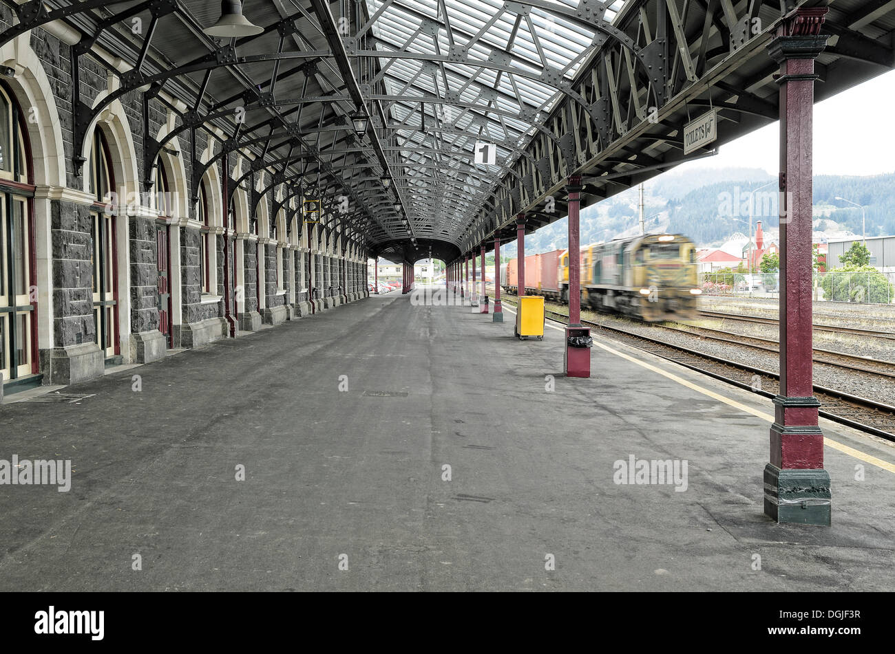 Platform with a train entering the station, historic Dunedin Railway ...