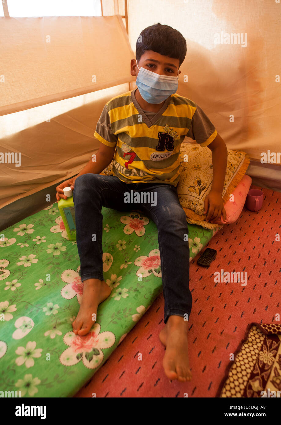 Ill Young Boy With A Mask In A Syrian Refugee Camp, Erbil, Kurdistan ...