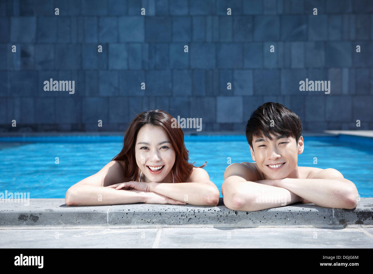 Couple and pool hi-res stock photography and images - Alamy