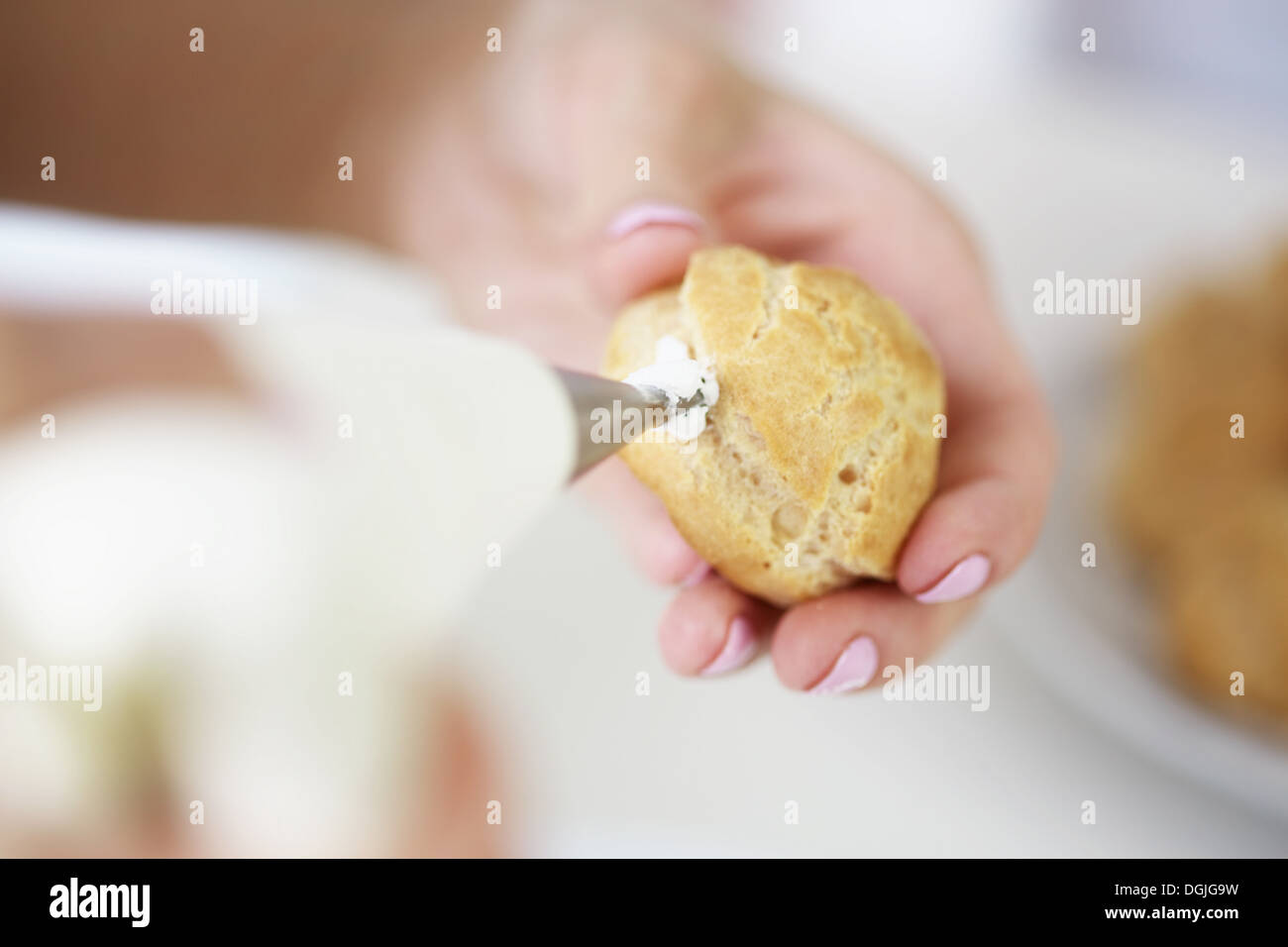 Young woman making cream hi-res stock photography and images - Alamy