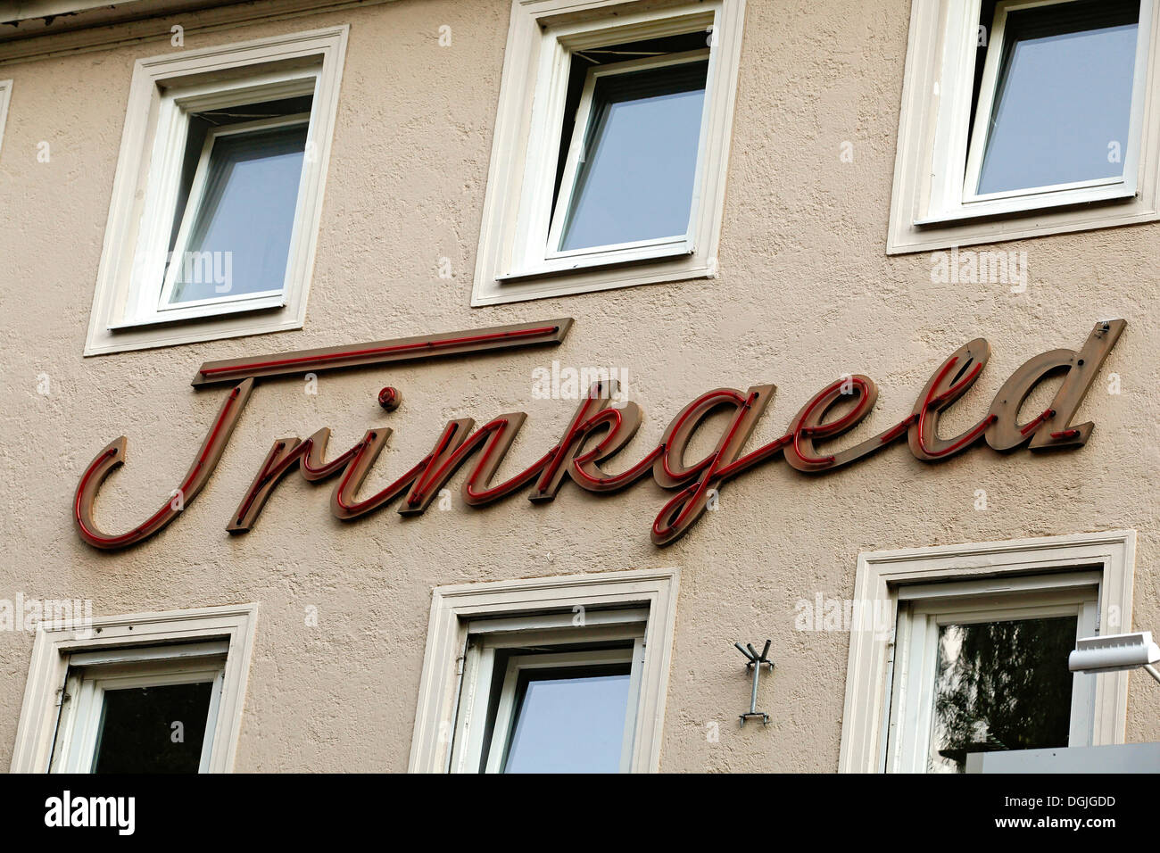 Trinkgeld, German for tip, sign on a house in Dachau, Upper Bavaria ...