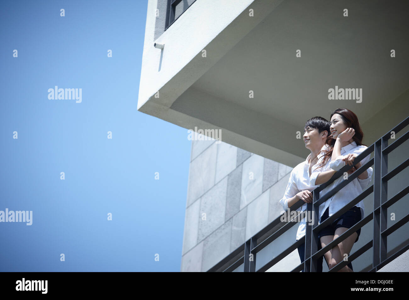 Standing on their balcony hi-res stock photography and images - Alamy