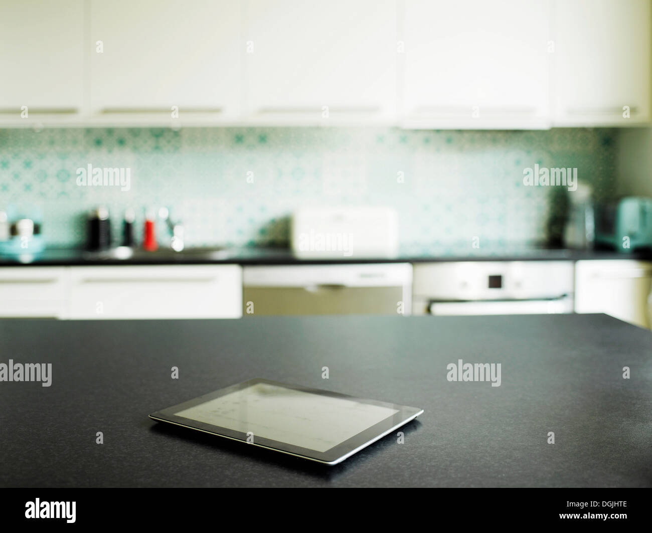 Tablet on counter hi-res stock photography and images - Alamy