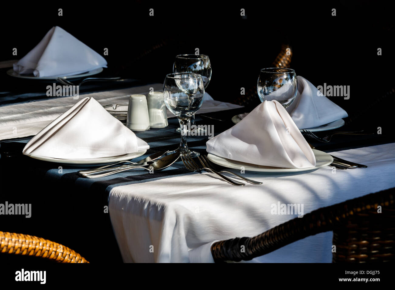 Table at restaurant served for reception of visitors Stock Photo - Alamy