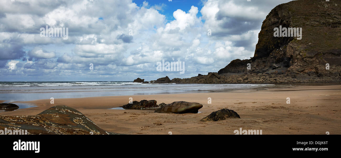 Duck Pool Bay with dramatic blue and cloudy sky. Near Kilkhampton ...