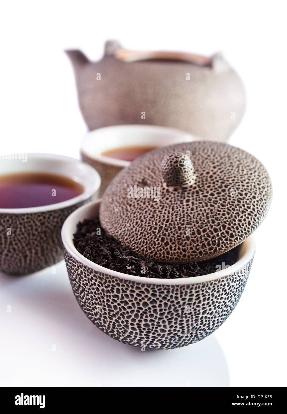 tea in small cups isolated on white reflective background Stock Photo ...