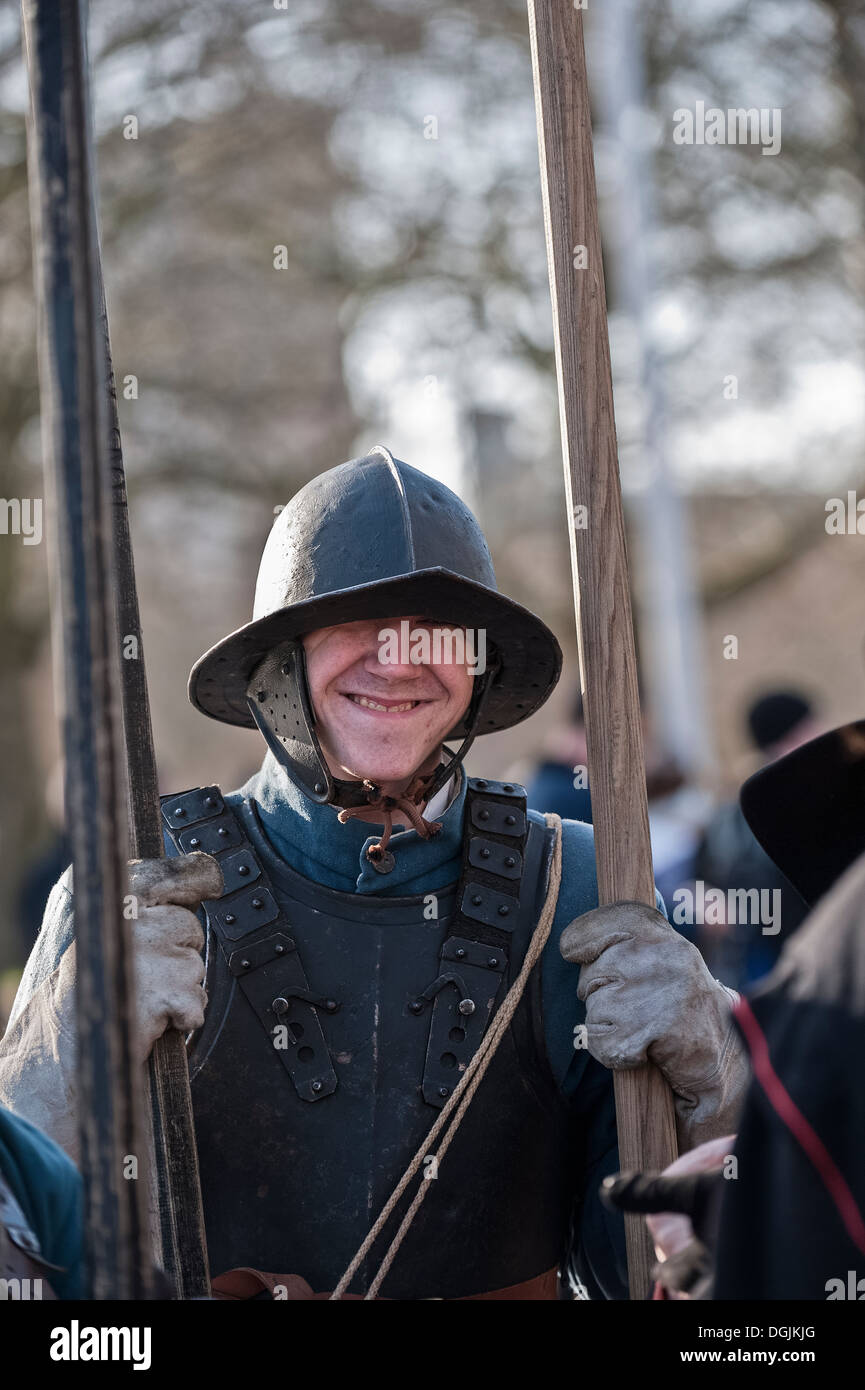 A member of the English Civil War Society preparing to march to ...