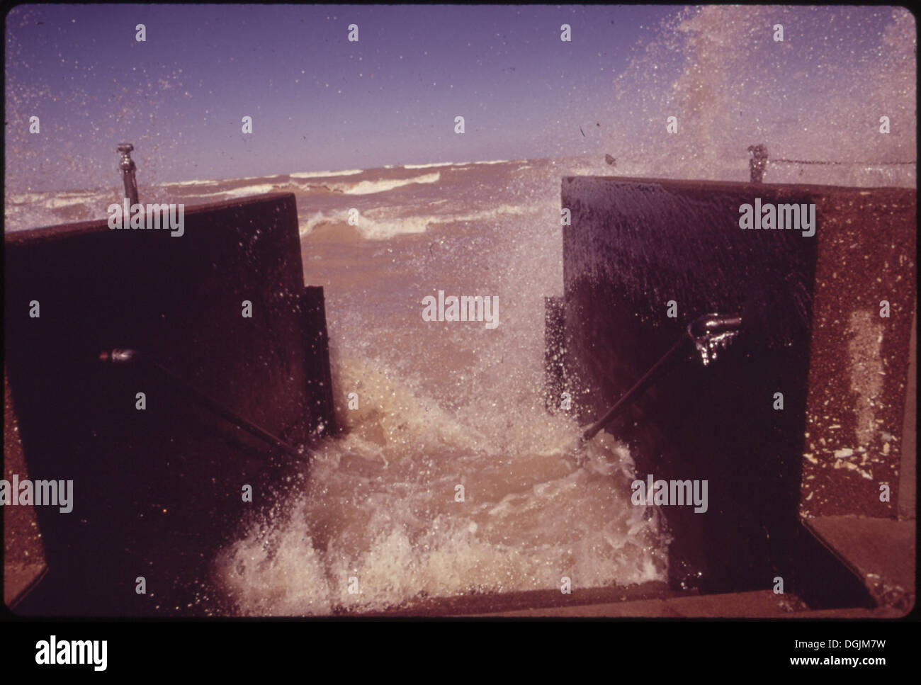 This photograph captures the intense waves of a winter storm on Lake ...