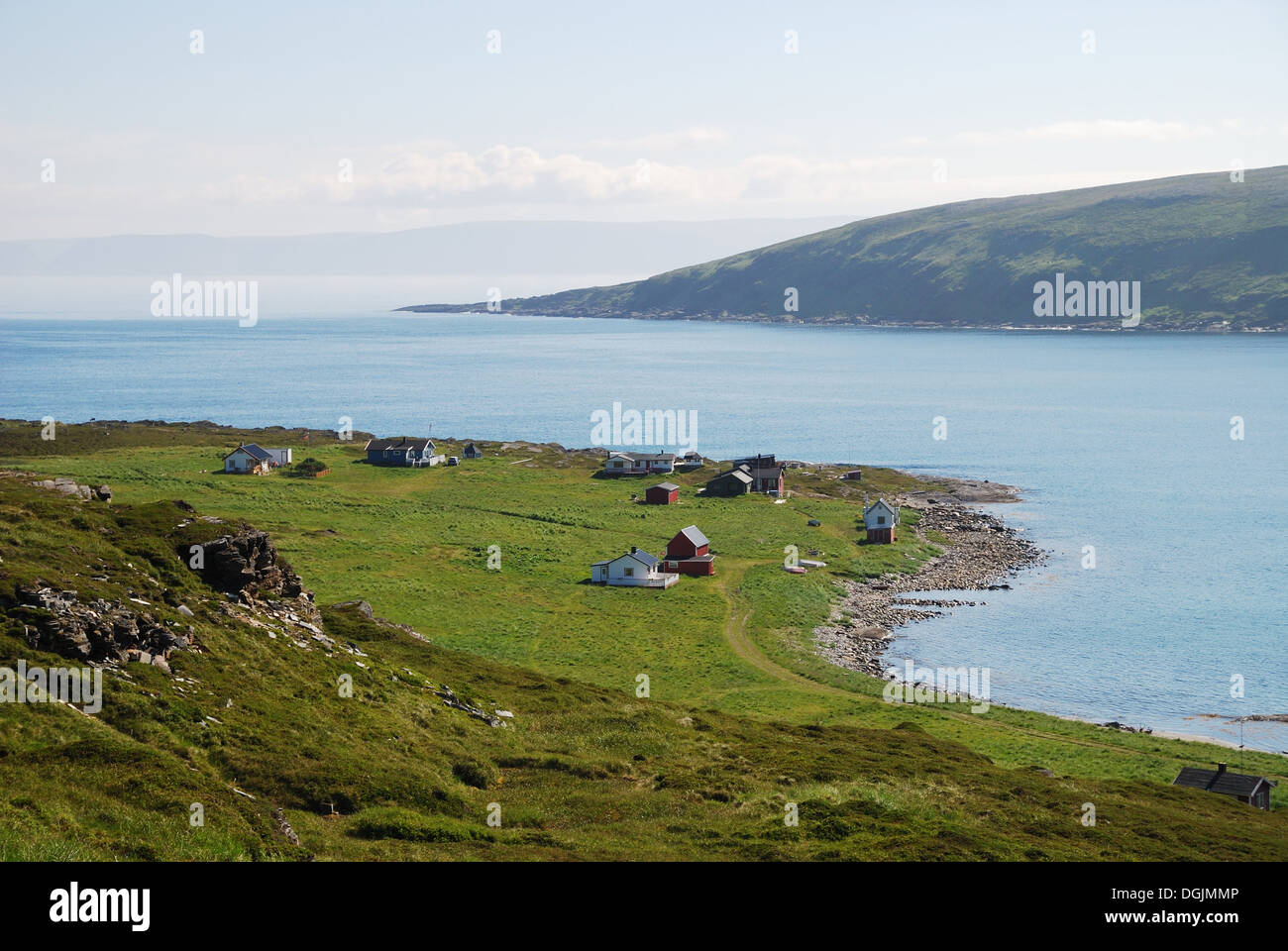 View of Mageroya with small fishing village near blue fjord Stock Photo ...