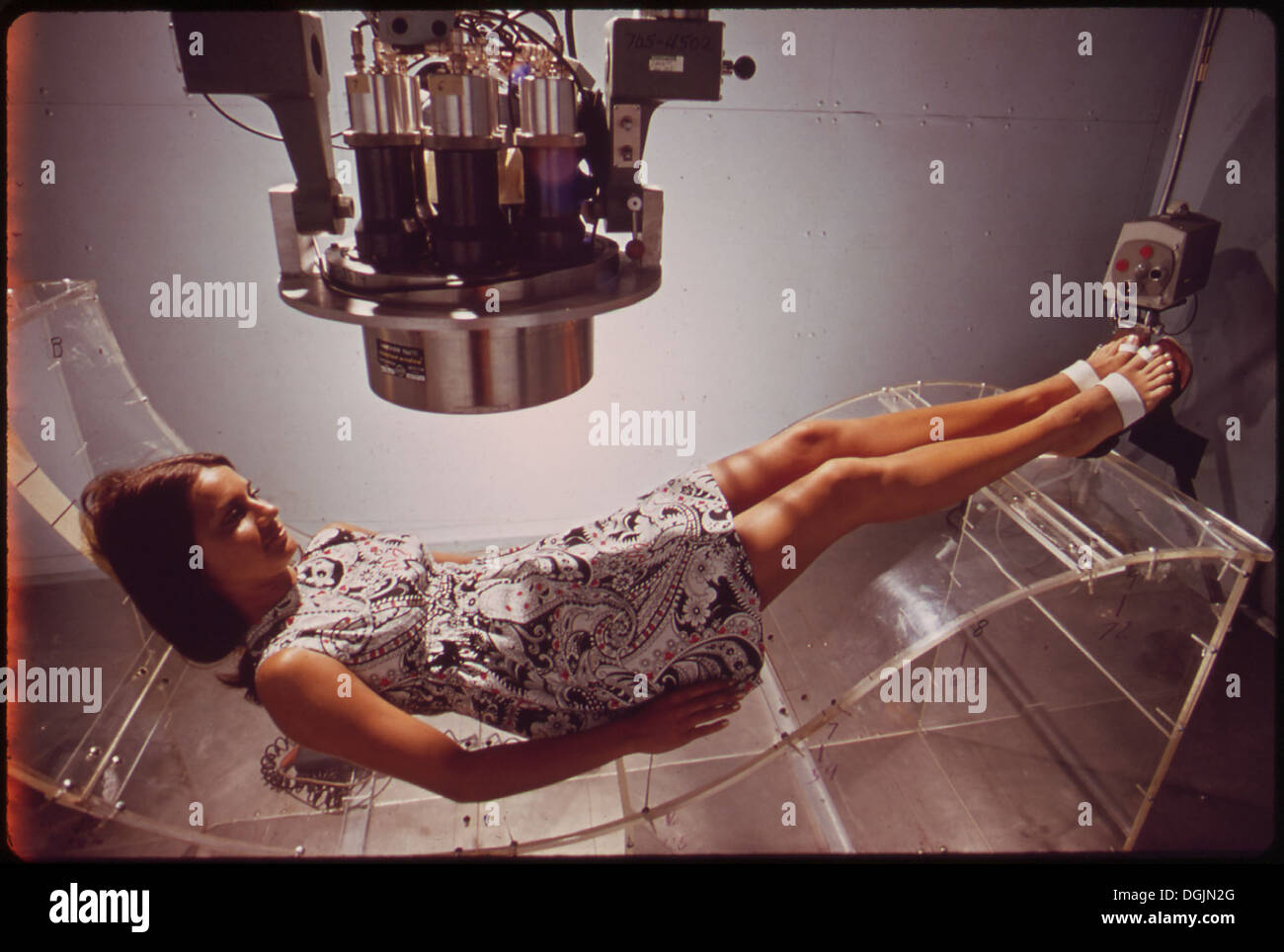 A whole-body counter being used to measure natural levels of radiation ...