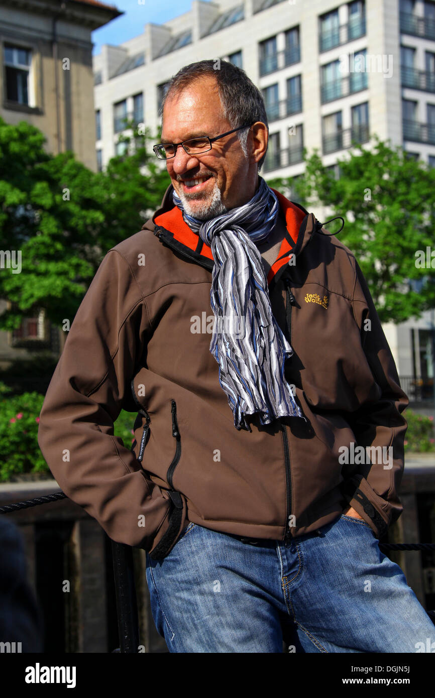 Middle-aged man during a boat tour, Berlin Stock Photo - Alamy