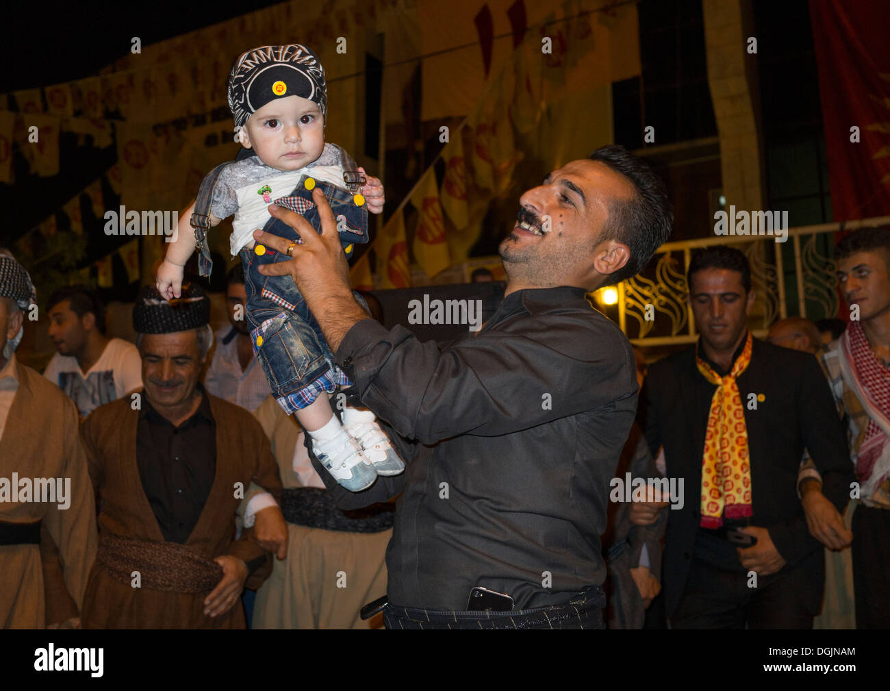 Man Holding His Baby During A Kdp Meeting, Suleymanyah, Kurdistan, Iraq ...