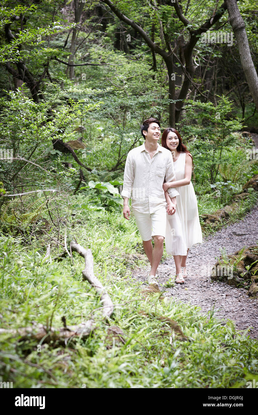 a couple walking in the nature Stock Photo - Alamy