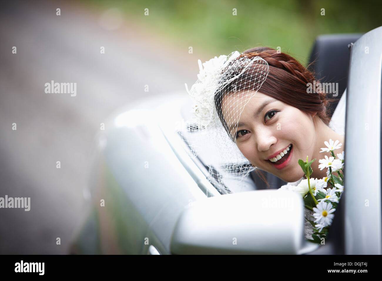 Bride standing in convertible car hi-res stock photography and images ...