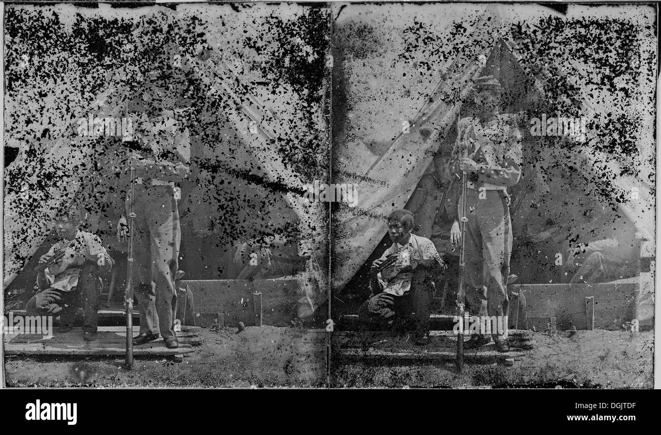 This photograph contrasts a soldier and servant, possibly from a ...