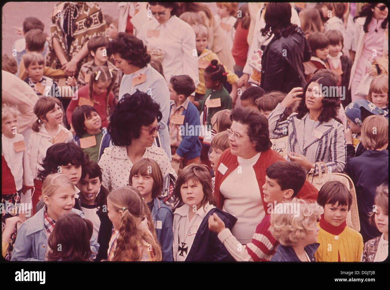 School children watch harbor activities from the deck of the Port ...