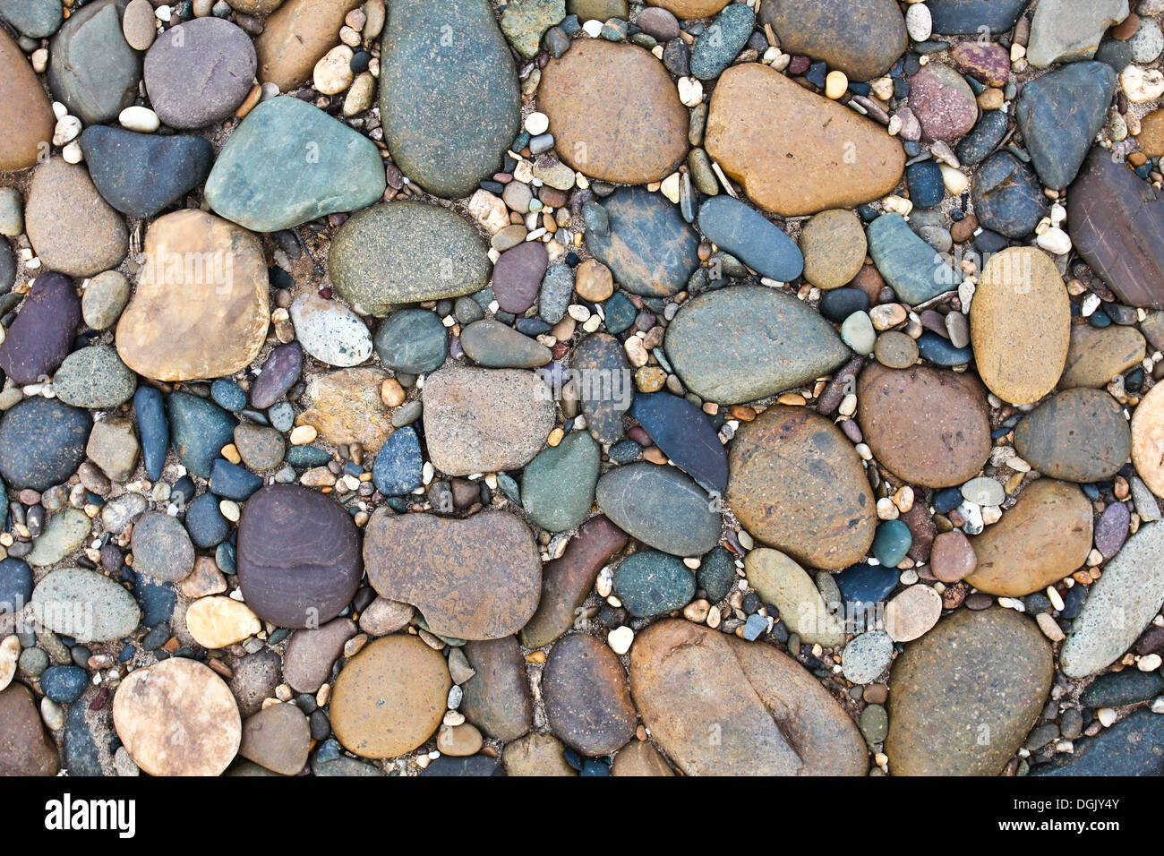 Various pebble stones texture Stock Photo - Alamy