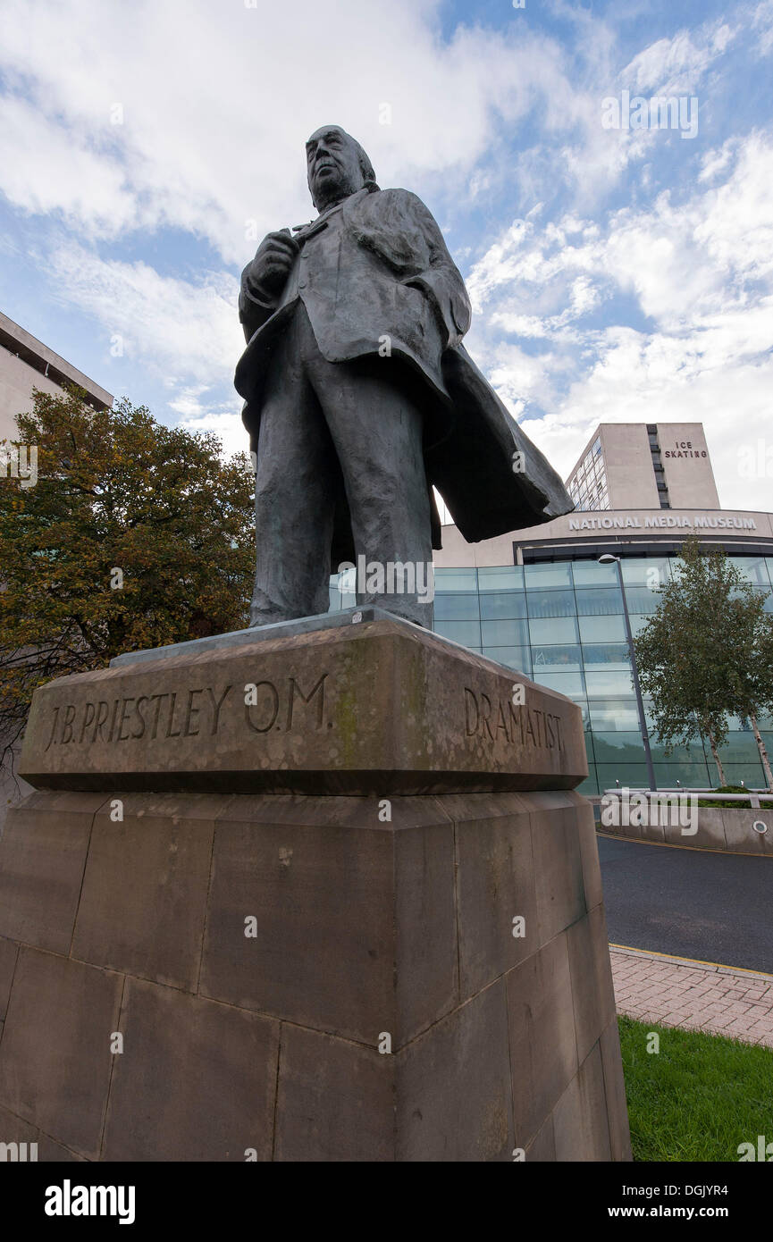Under blue sky, lifelike bronze statue of J.B Priestley outside Science ...