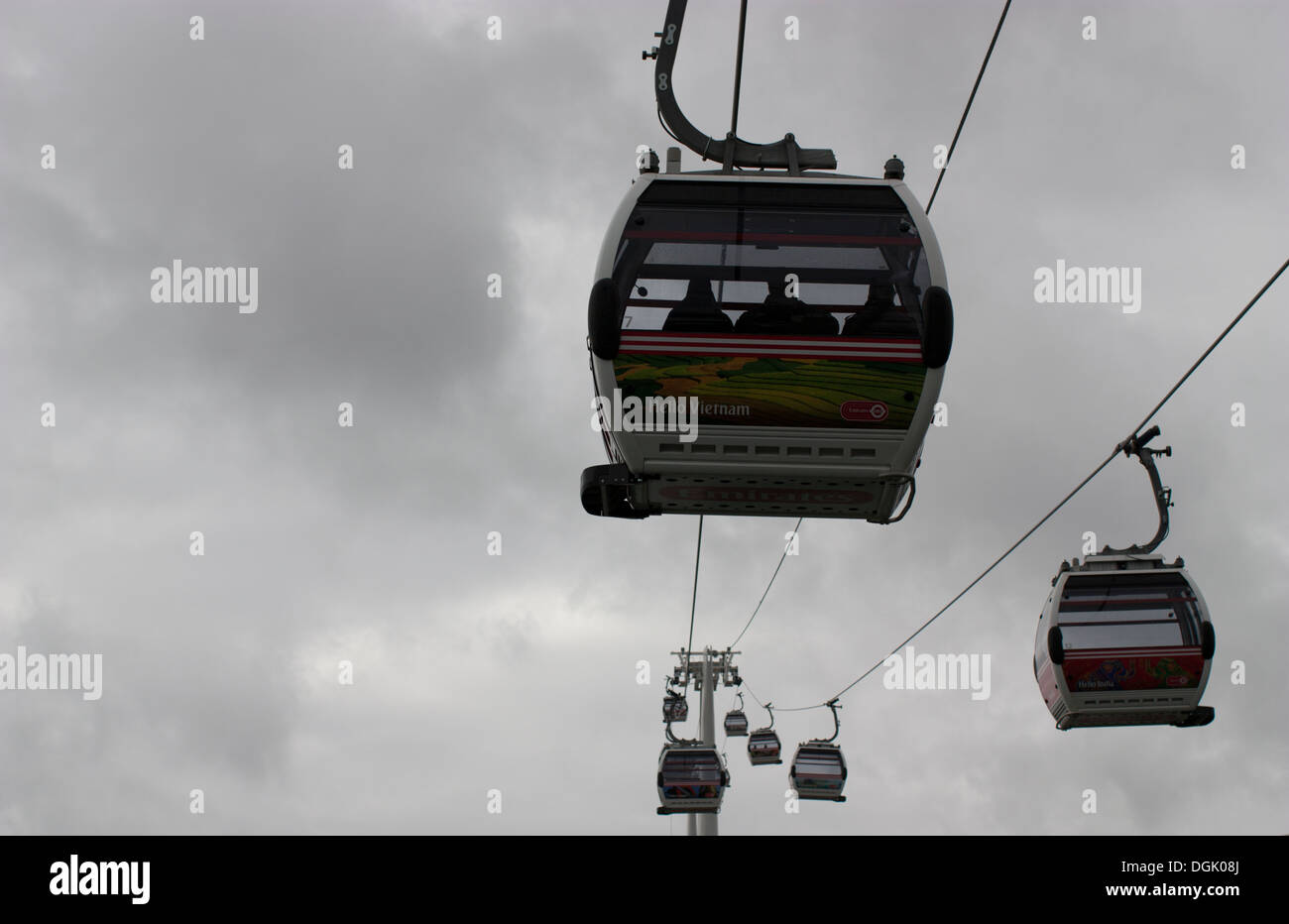 The Emirates Air Line cable car in Royal Docks, London, UK, set against ...