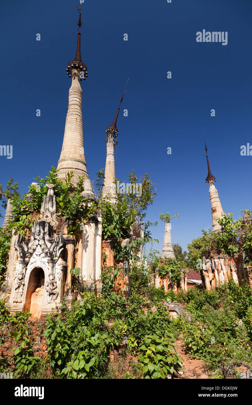 The abandoned and overgrown pagodas of Inn Thein in Myanmar Stock Photo ...