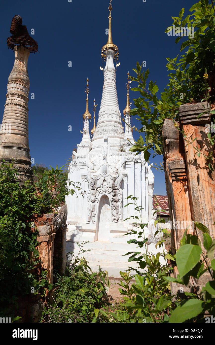 The abandoned and overgrown pagodas of Inn Thein in Myanmar Stock Photo ...