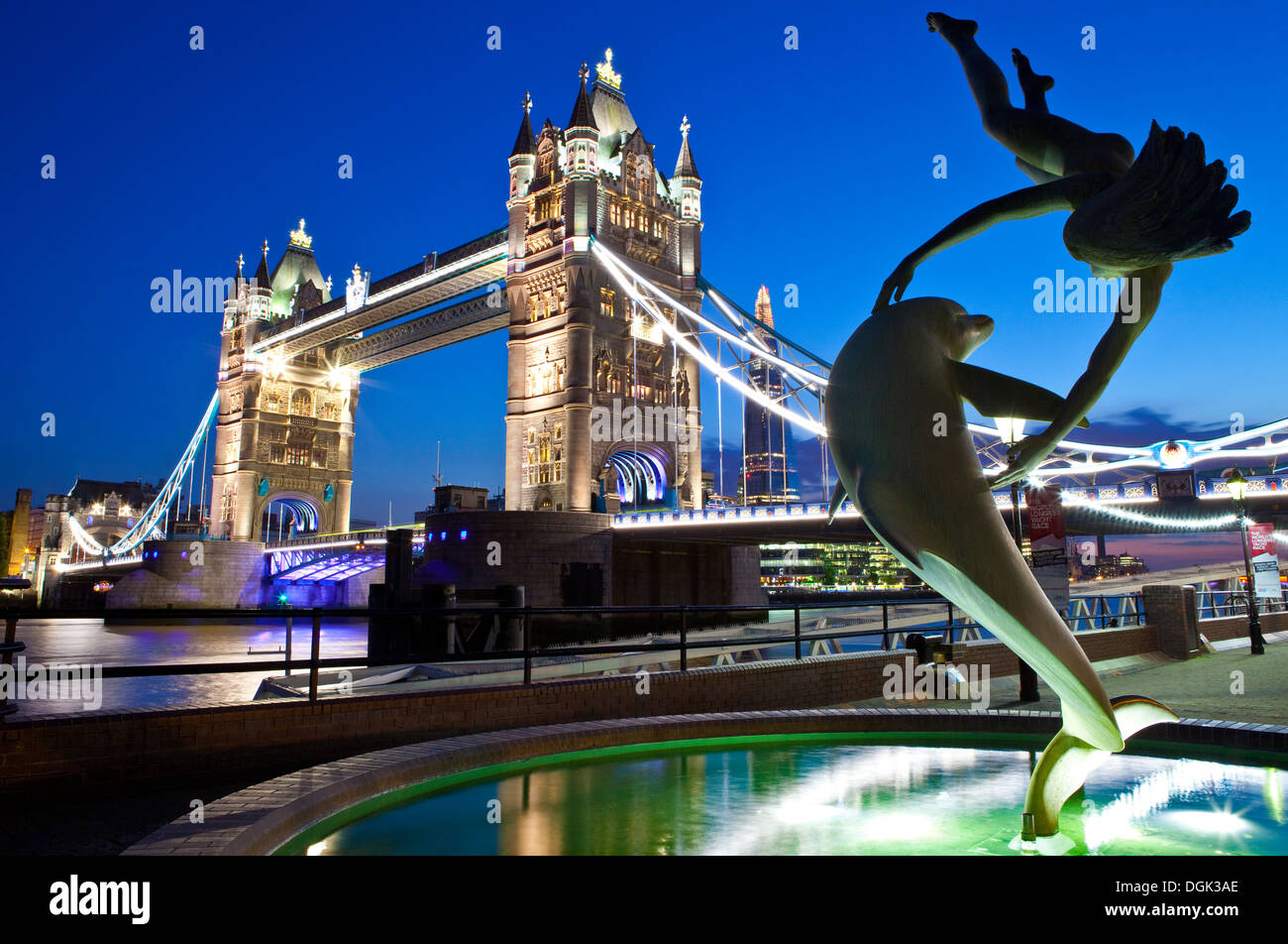 The magnificent Tower Bridge and 'Girl with a Dolphin' statue in London ...