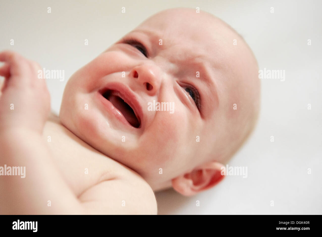 Baby boy crying Stock Photo - Alamy