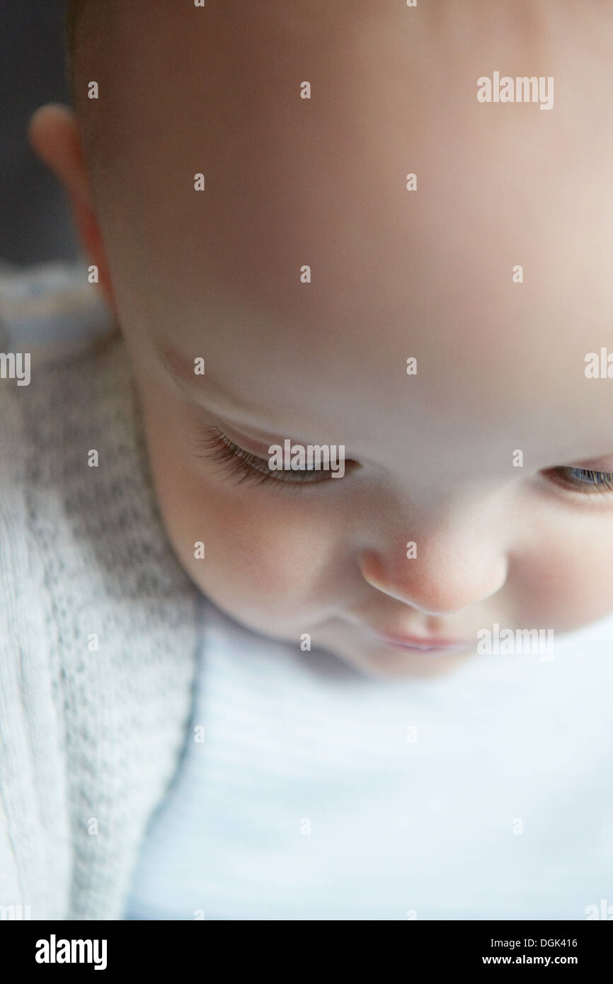 Boy looking down hi-res stock photography and images - Alamy