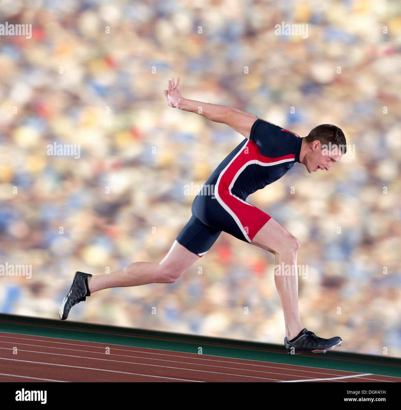 Athlete finishing race Stock Photo - Alamy