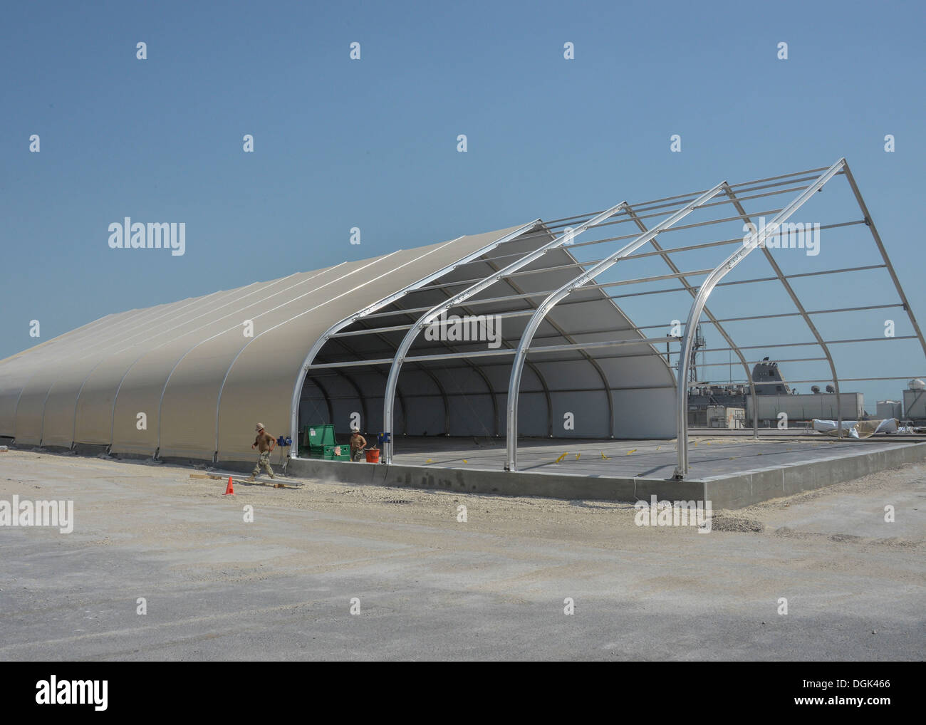 Seabees assigned to Commander, Task Group (CTG) 56.2, exit a tension ...