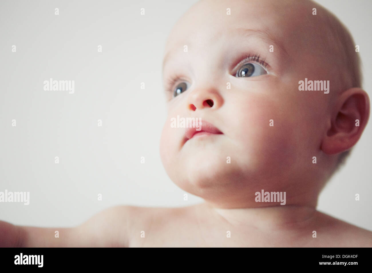Portrait of baby boy looking up Stock Photo - Alamy
