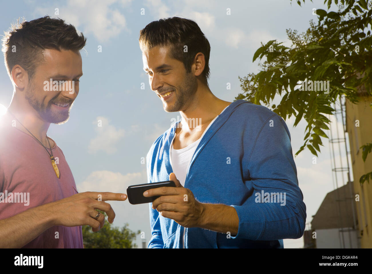 Two men pointing hi-res stock photography and images - Alamy