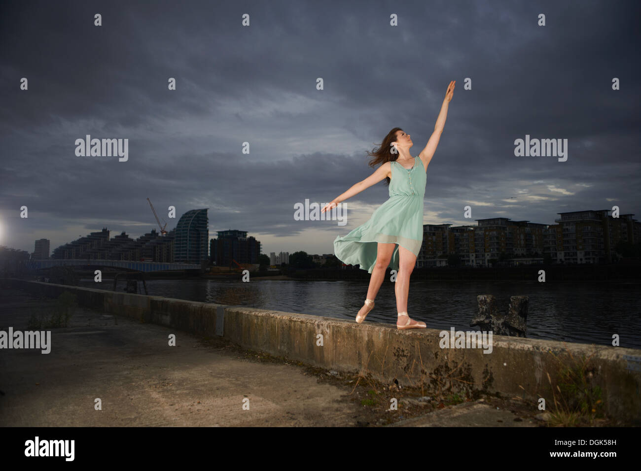 Ballet dancer reaching upwards on wall Stock Photo - Alamy