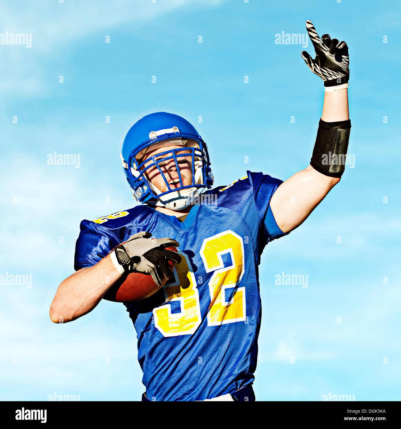Sport football action arm raised hi-res stock photography and images ...