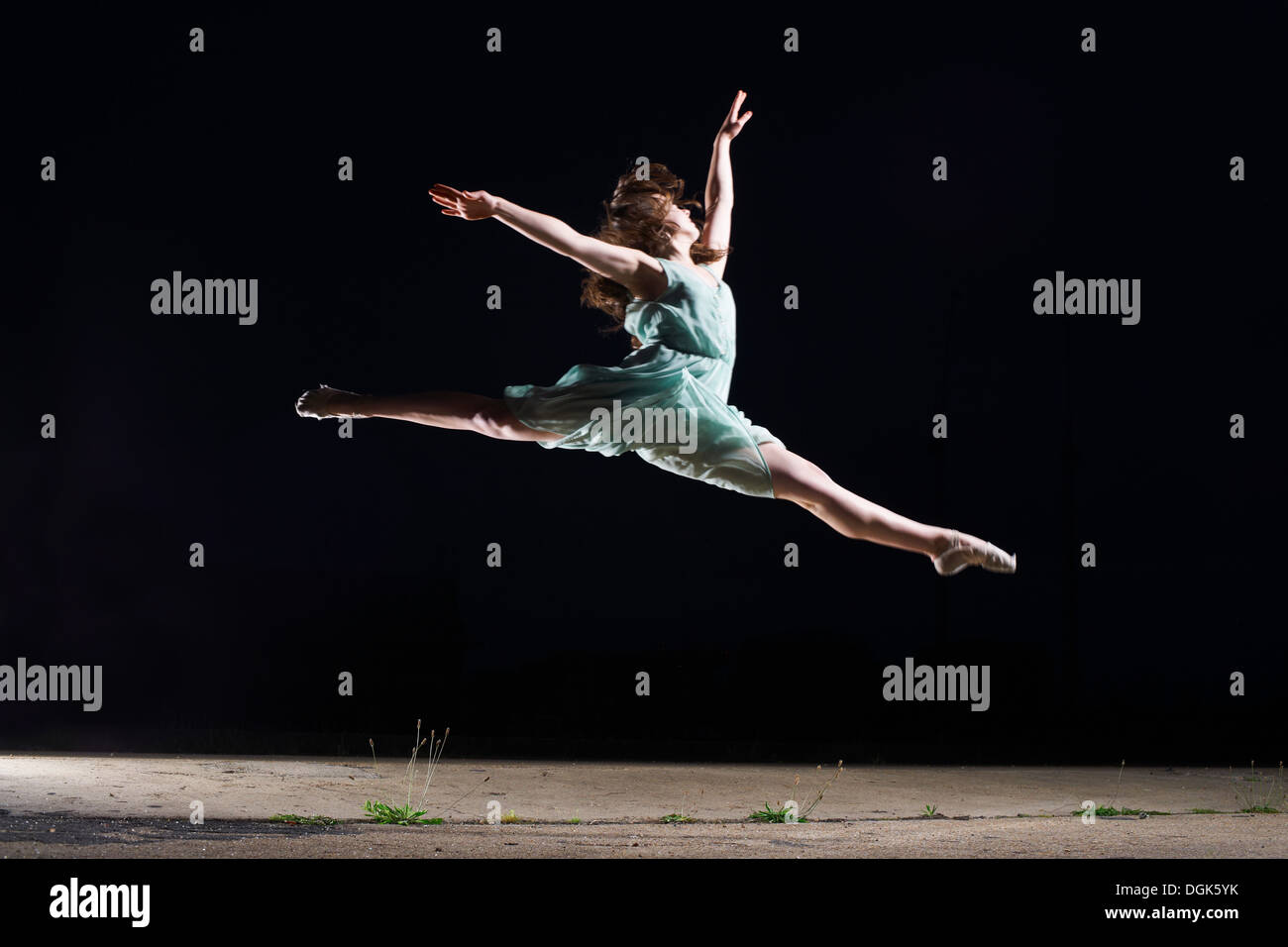 Leaping woman dress hi-res stock photography and images - Alamy