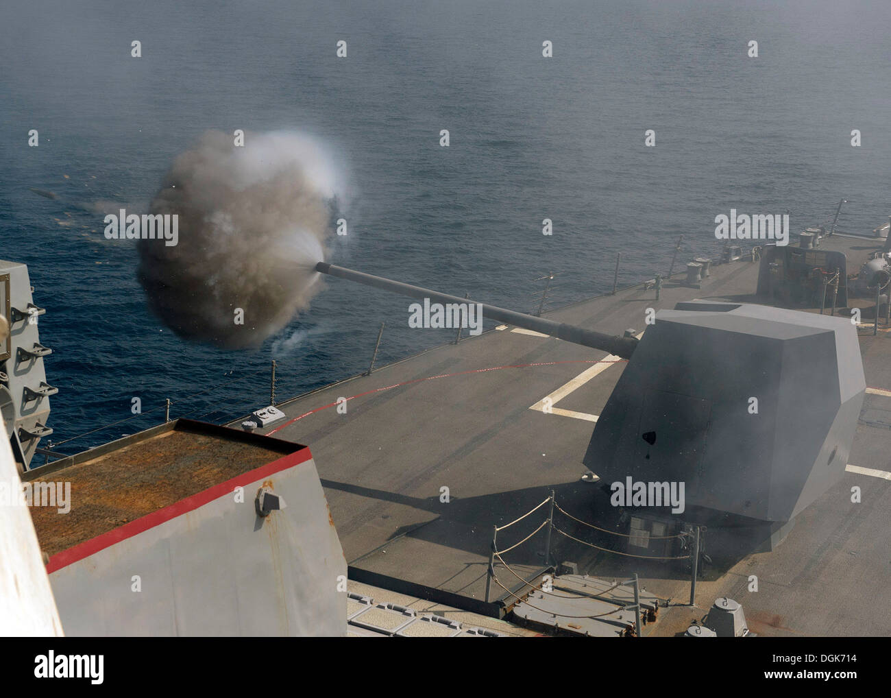 The guided-missile destroyer USS Bulkeley (DDG 84) fires its 5-inch gun ...