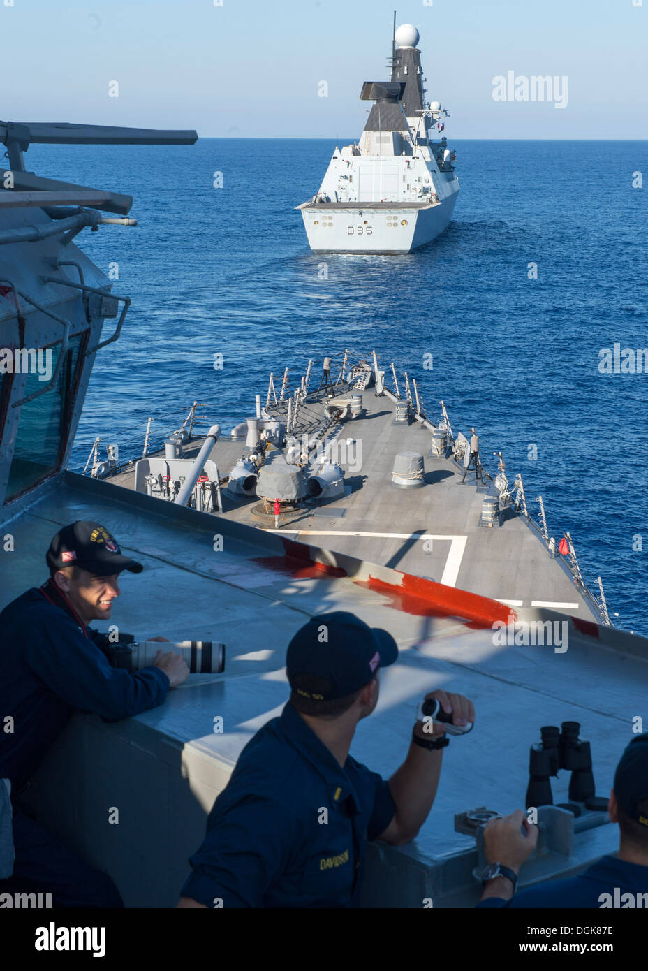 Sailors aboard the Arleigh Burke-class guided-missile destroyer USS ...
