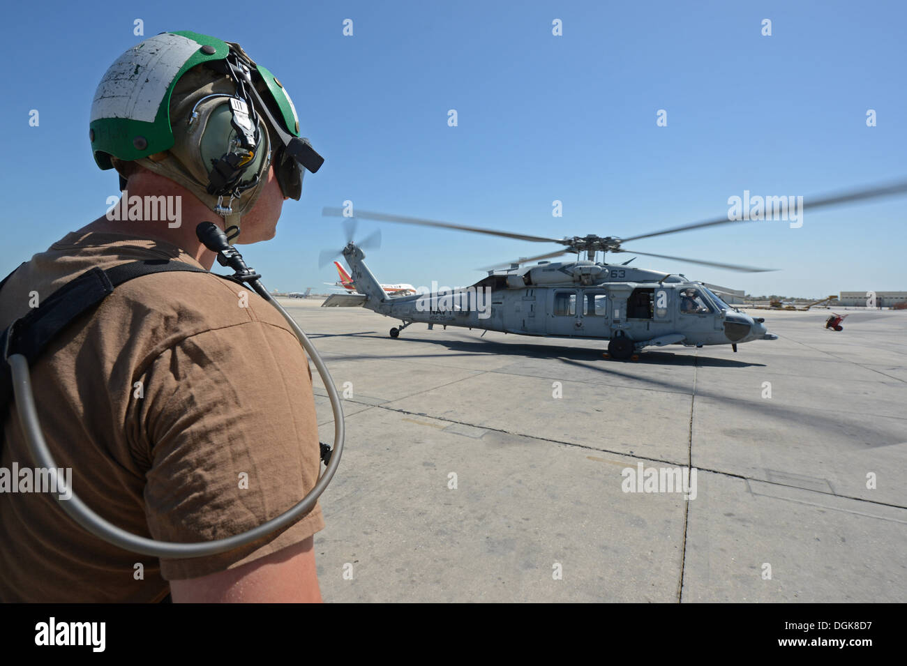 Sailor assigned to Helicopter Sea Combat Squadron (HSC) 26 maintains a ...